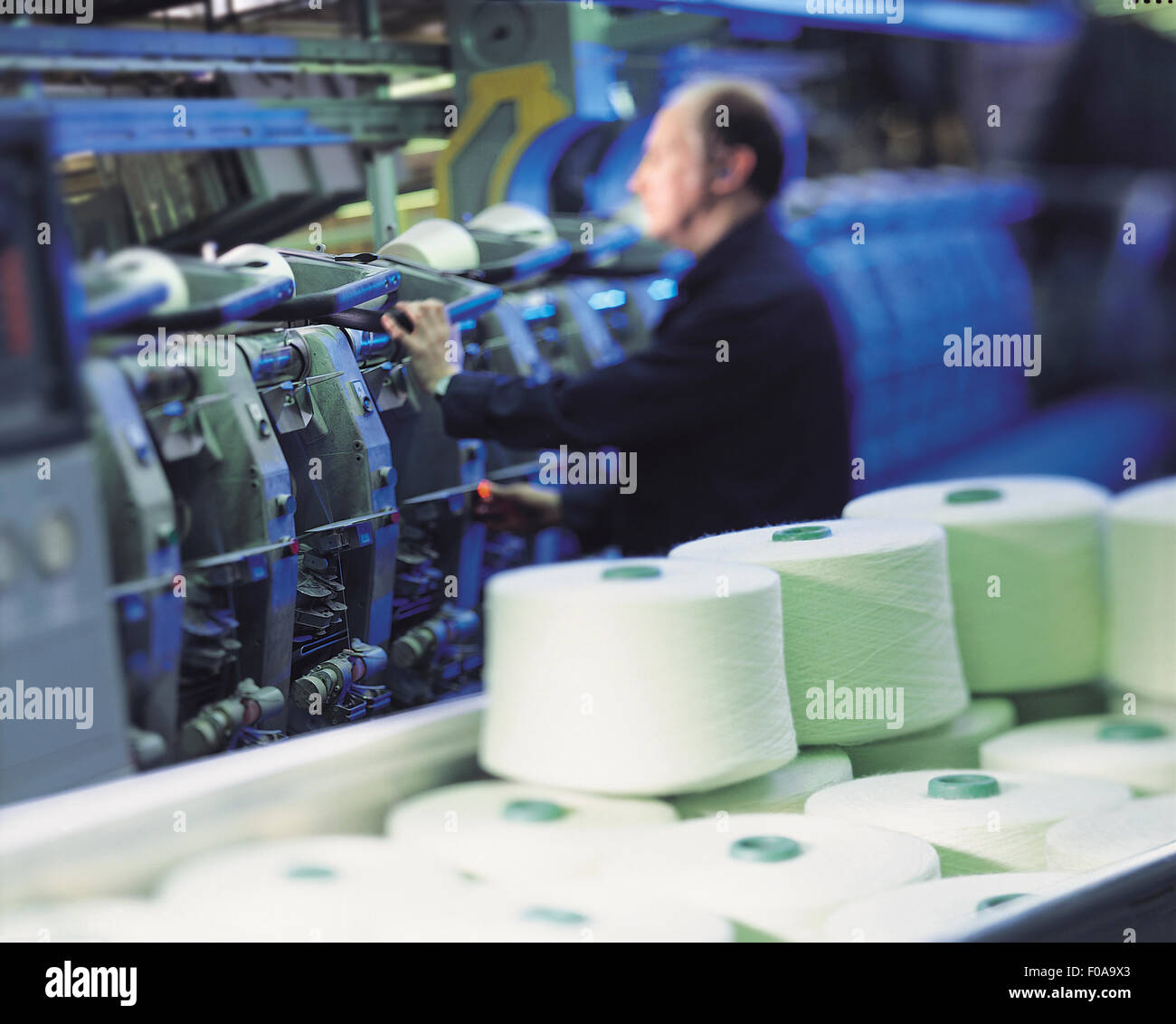 Textiles worker hi-res stock photography and images - Alamy