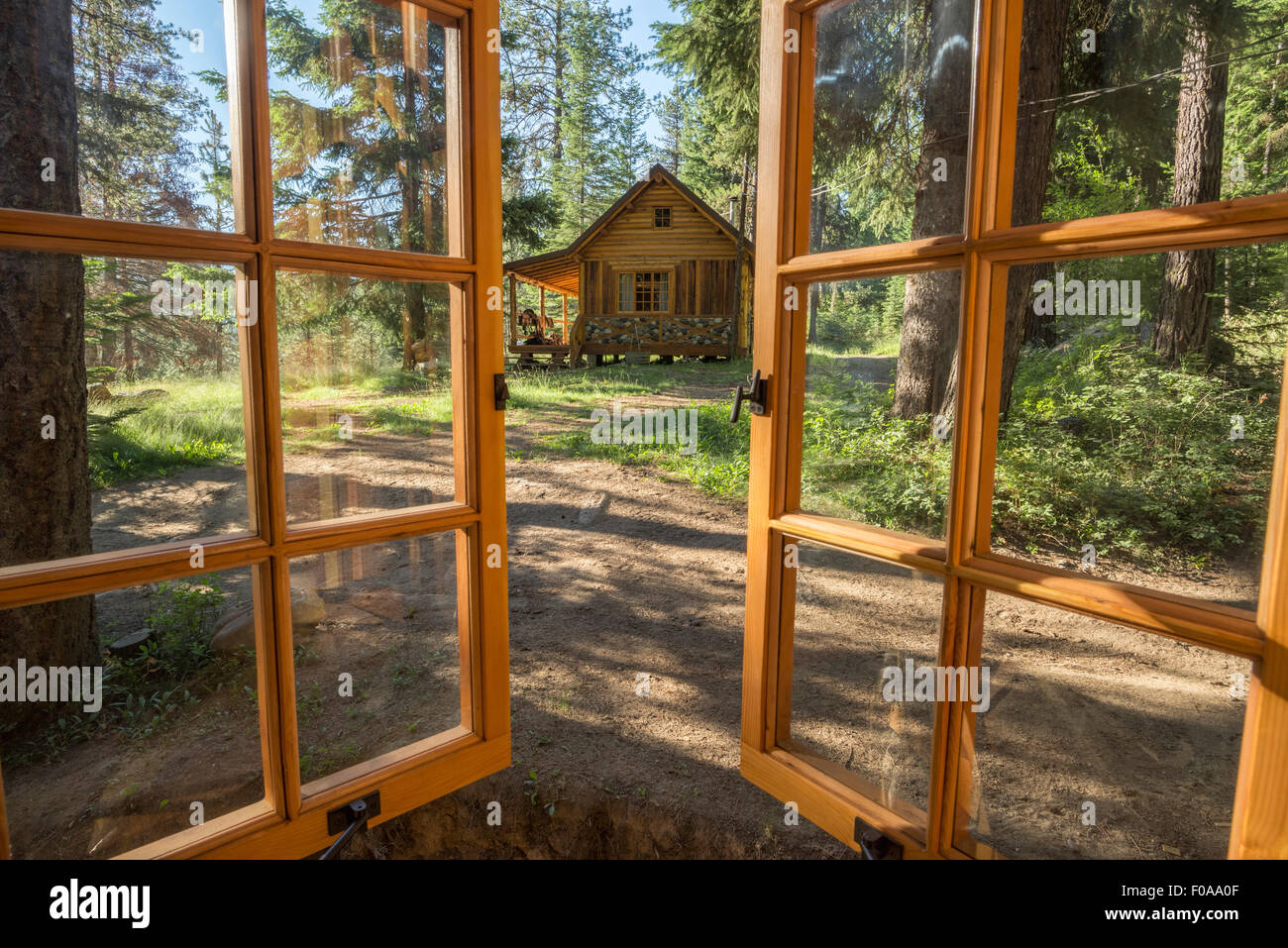 View out the window of a log cabin at the Minam River Lodge in Oregon's ...