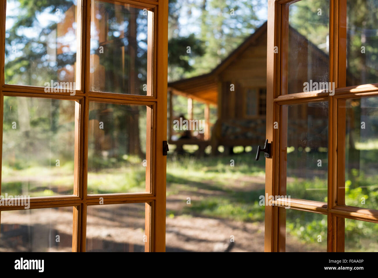 View out the window of a log cabin at the Minam River Lodge in Oregon's ...