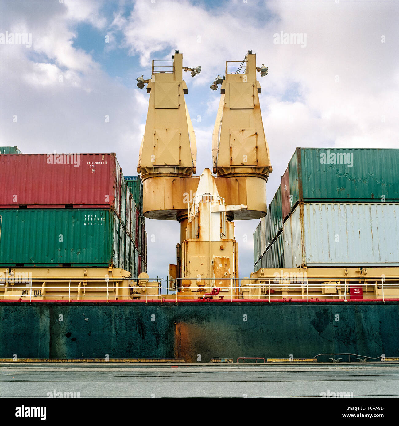 Shipping containers stacked on container ship Stock Photo - Alamy