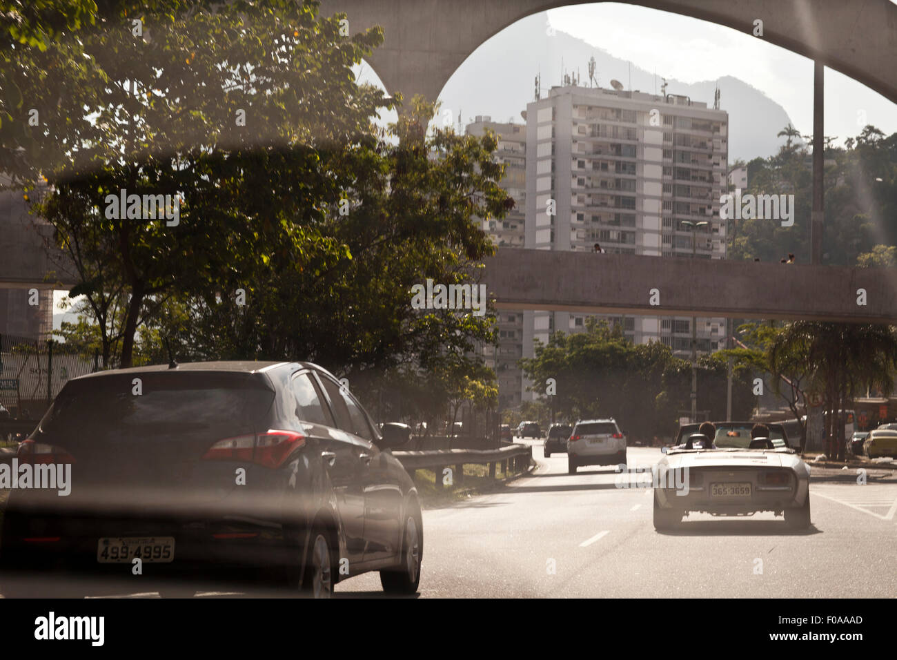 Cars driving on road hi-res stock photography and images - Alamy