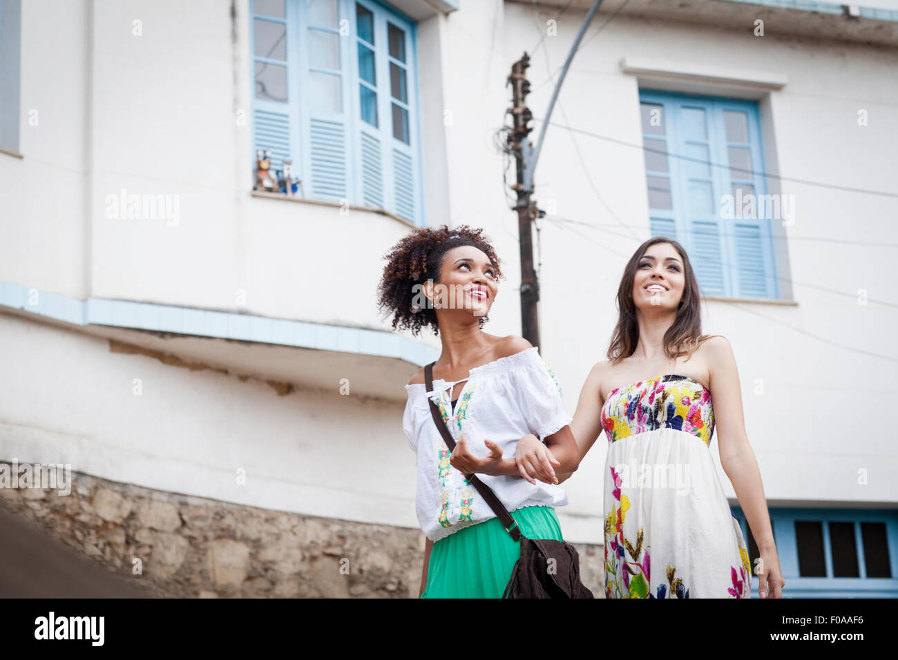Two people walking street hi-res stock photography and images - Alamy