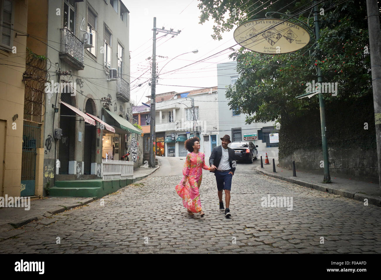 Full length holding hands looking down hi-res stock photography and ...
