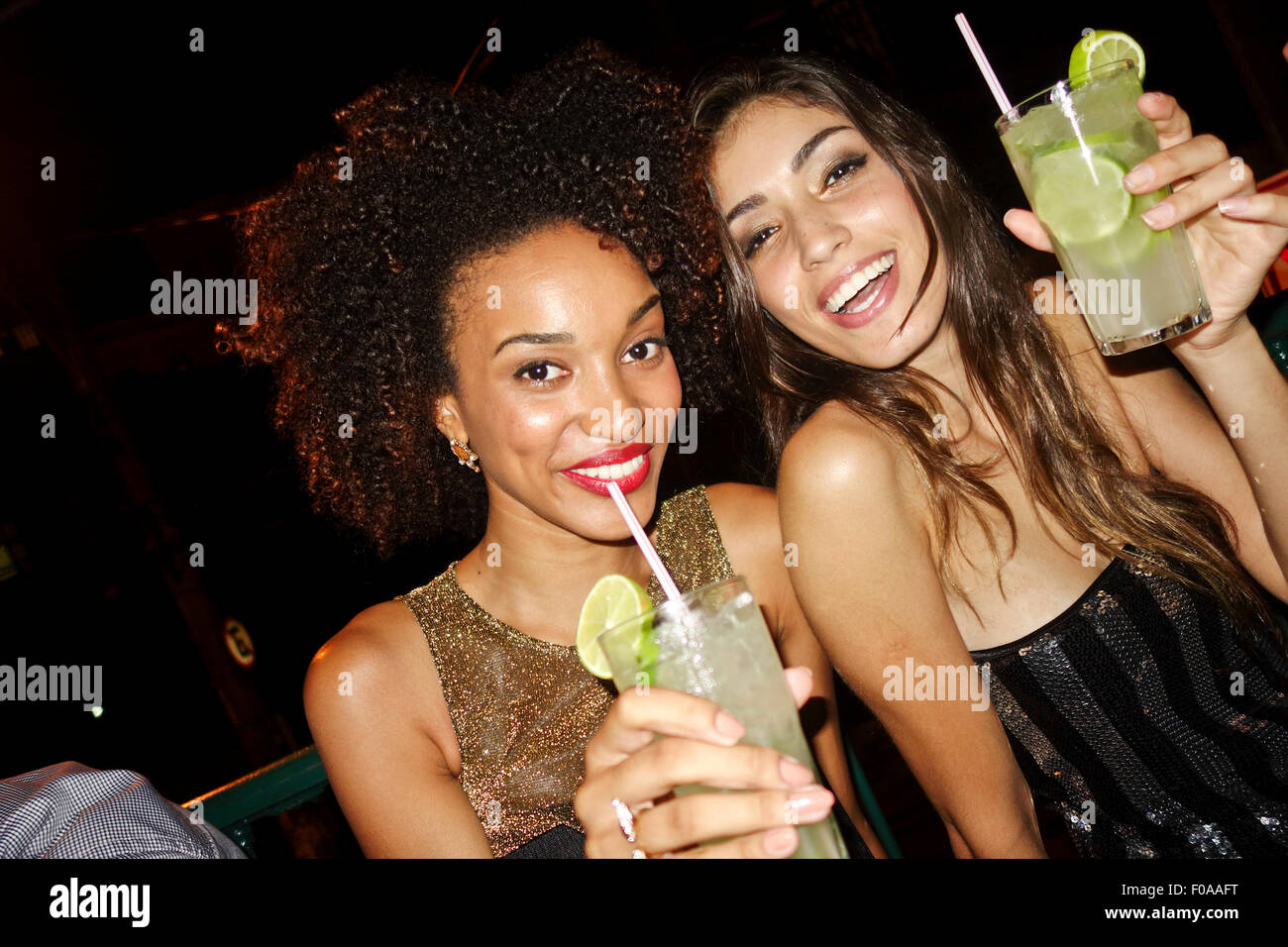Girls drinking cocktails in bar hi-res stock photography and images - Alamy