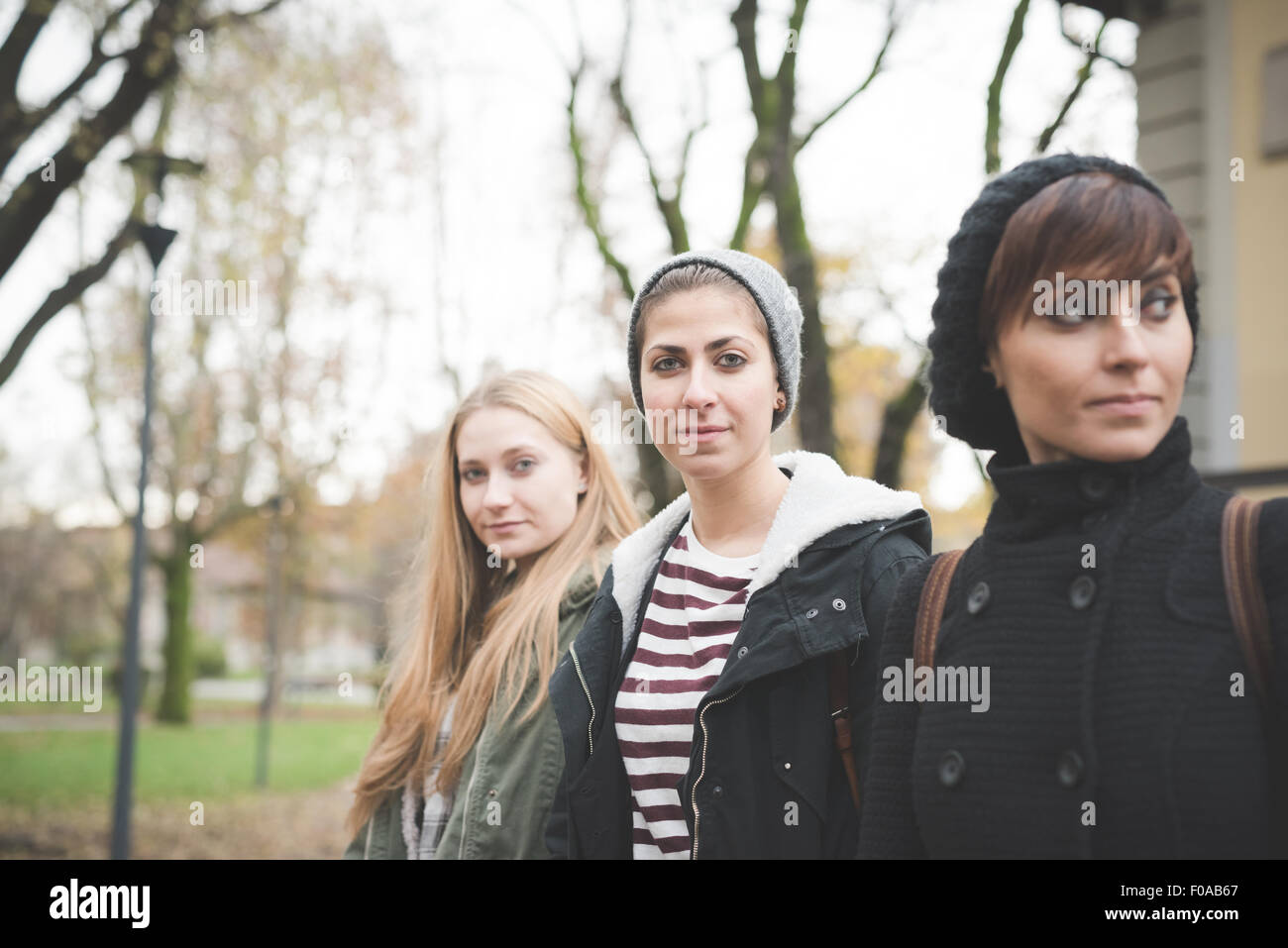Three Sisters Posing In Park High Resolution Stock Photography and ...