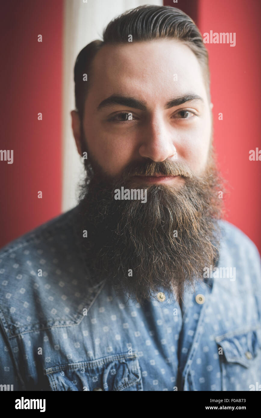 Portrait of young bearded man Stock Photo - Alamy