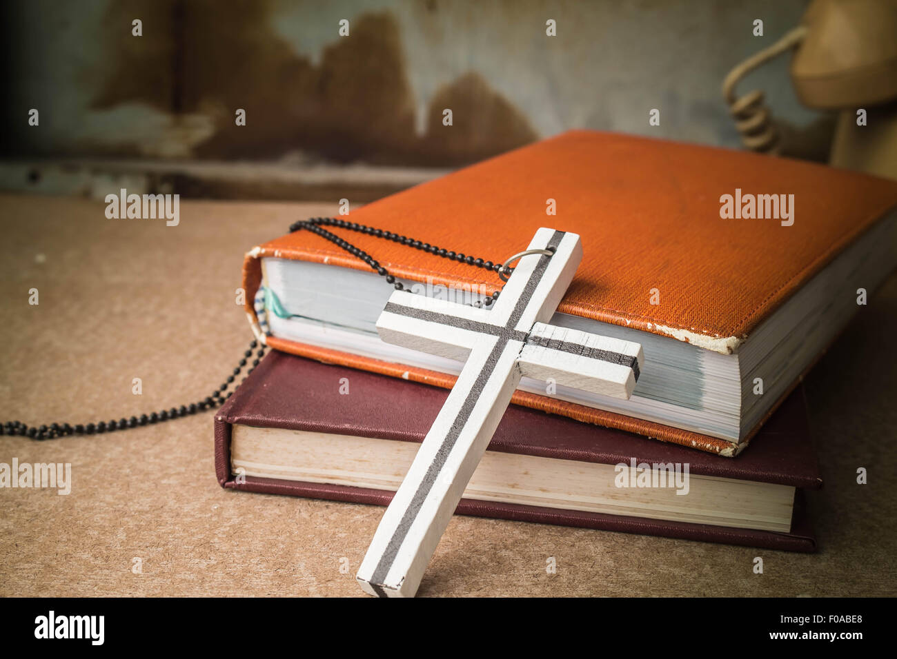 Crosses and books on a wooden Stock Photo - Alamy