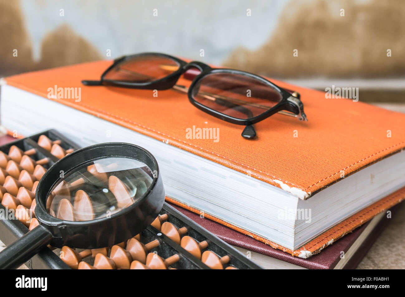 Magnifying glass and working equipment Stock Photo - Alamy
