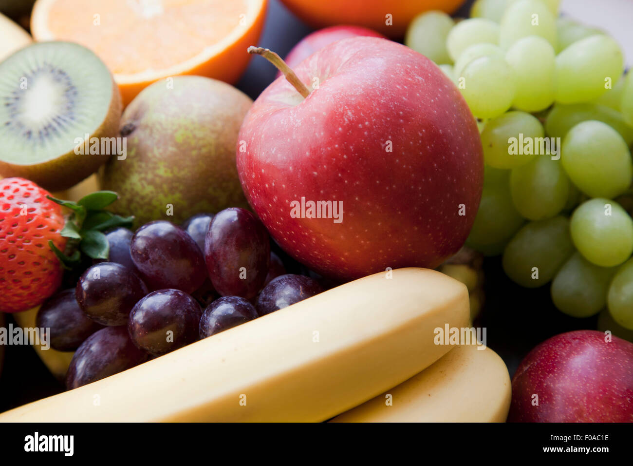 Close up still life with variety of fruit Stock Photo - Alamy