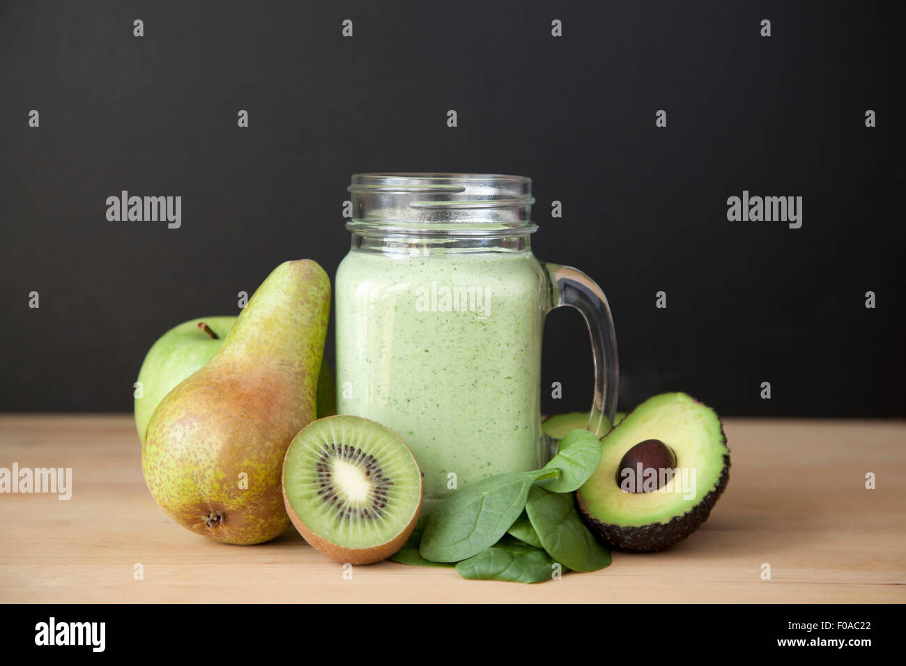 Still life of fresh kiwi, pear and avocado smoothie Stock Photo - Alamy