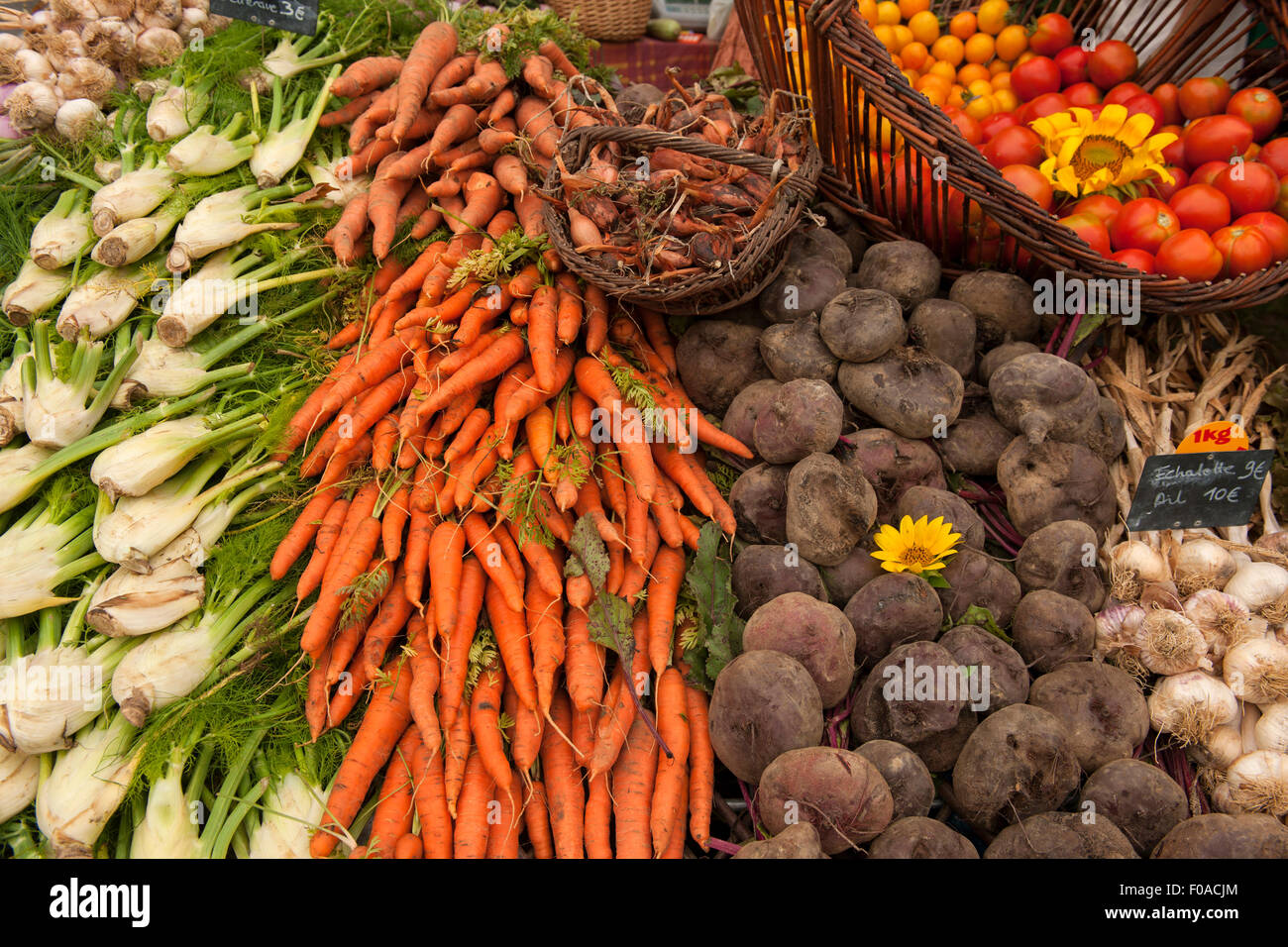 Traditional French market stall with vegetables on display, Issigeac ...