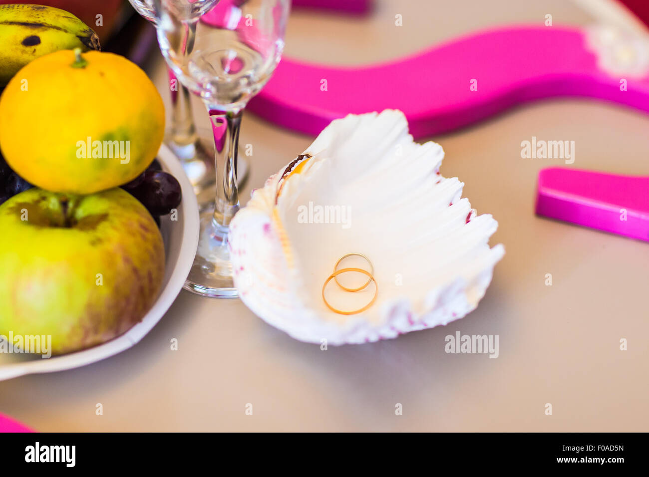 gold wedding rings on the plate Stock Photo - Alamy