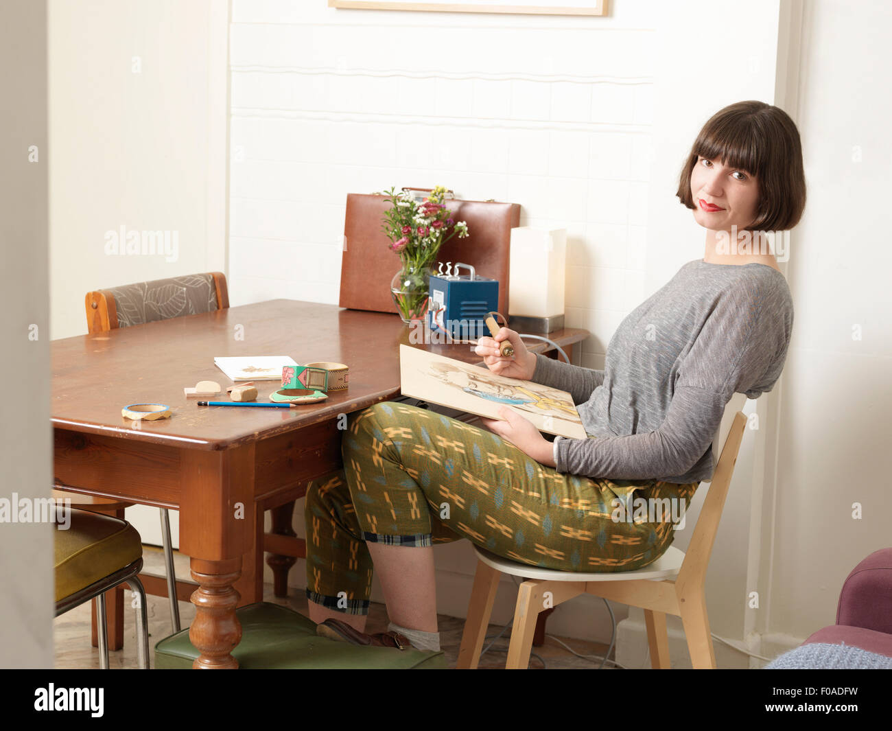 Female artist at work Stock Photo - Alamy
