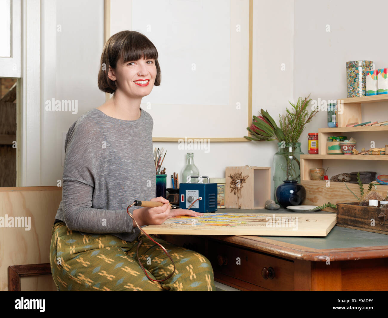 Female artist at work Stock Photo - Alamy