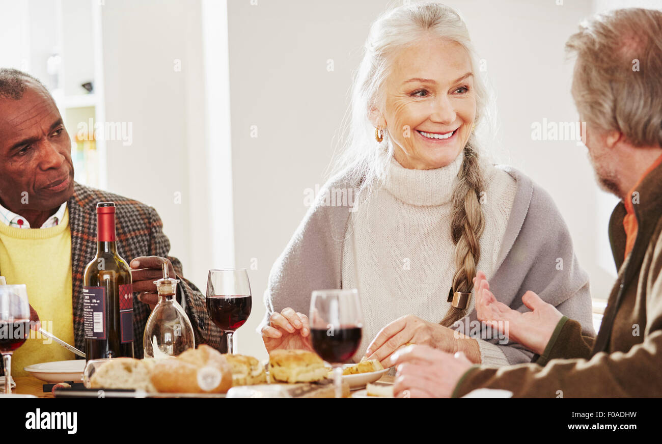 Dining with friends older people hi-res stock photography and images ...