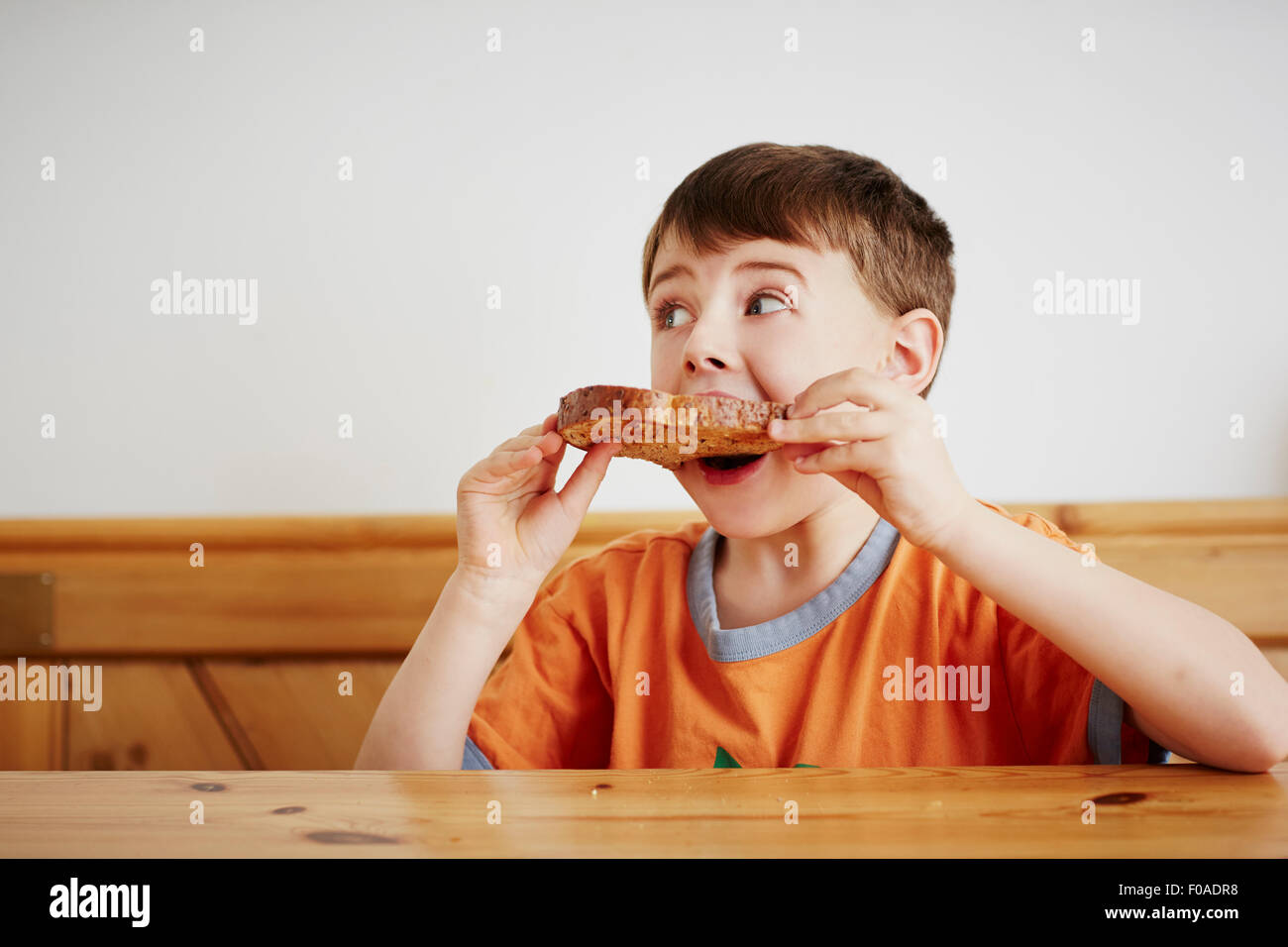 Young boys eating breakfast hi-res stock photography and images - Alamy