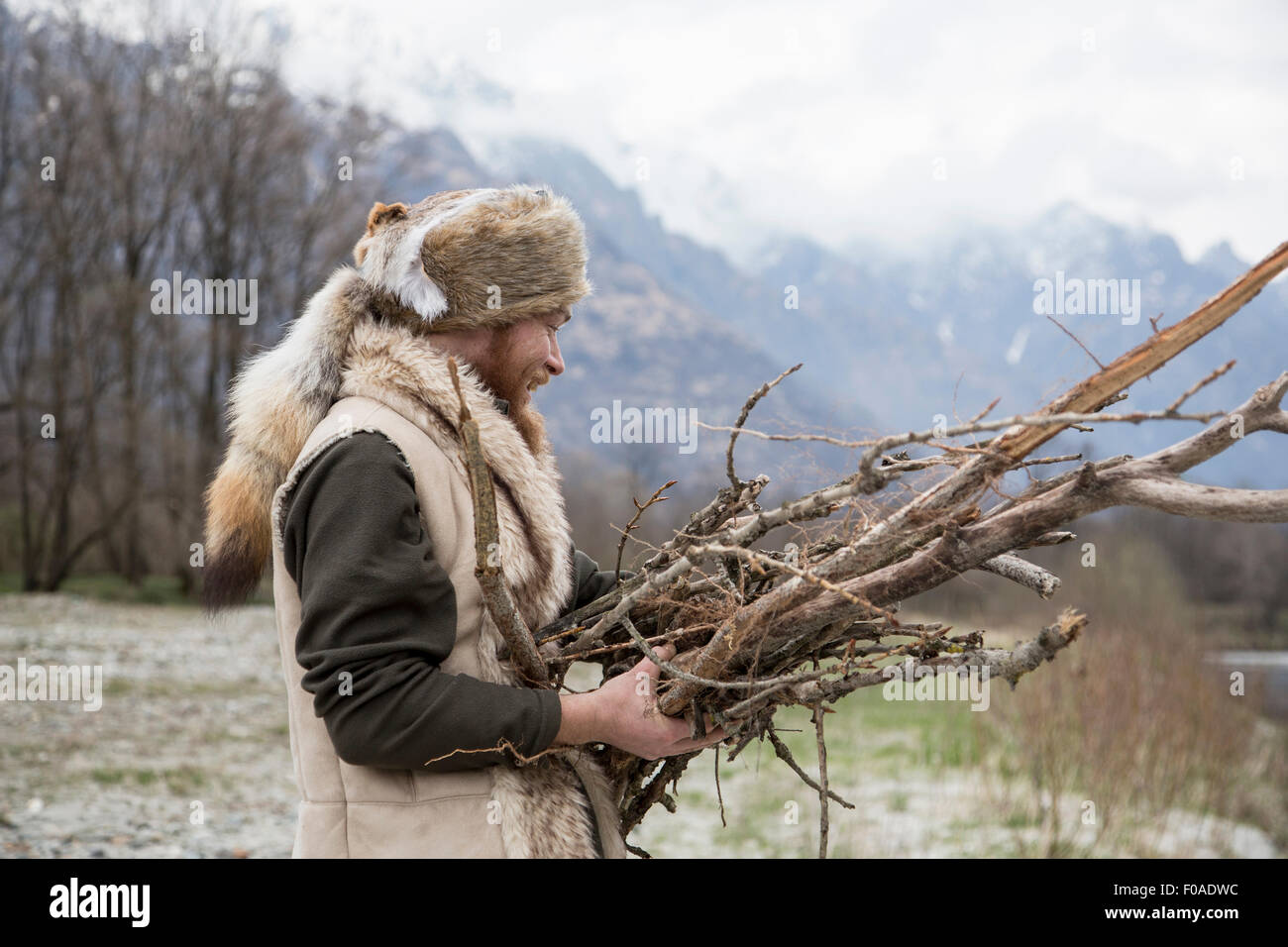 Gathering firewood hi-res stock photography and images - Alamy