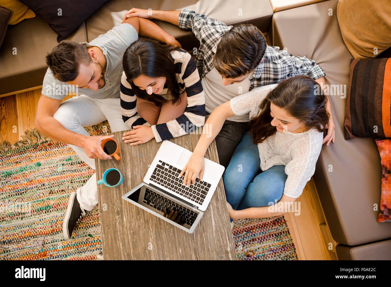 Group of friends study at the local coffee shop Stock Photo - Alamy