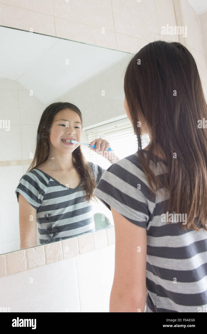 Person brushing teeth electric toothbrush hi-res stock photography and ...