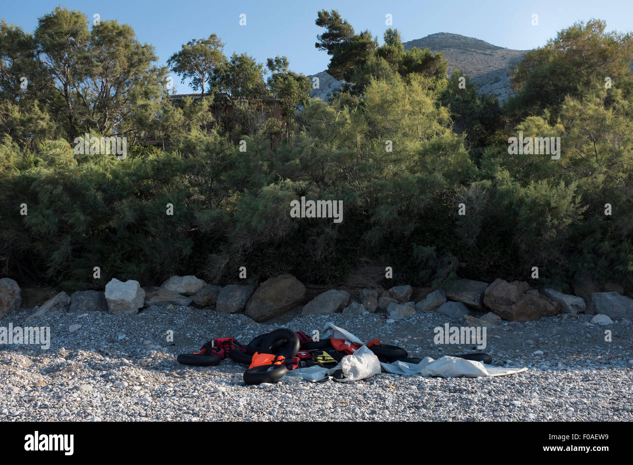 Abandoned life jackets and tyre inner tubes left by Syrian refugees on ...