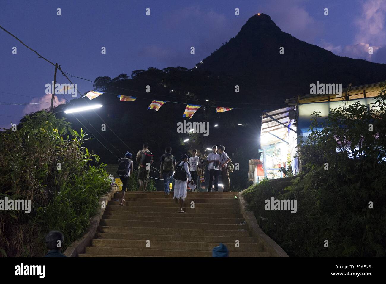 Pilgrims climbing stairs at night in Sri Pada mountain, Sri Lanka Stock ...