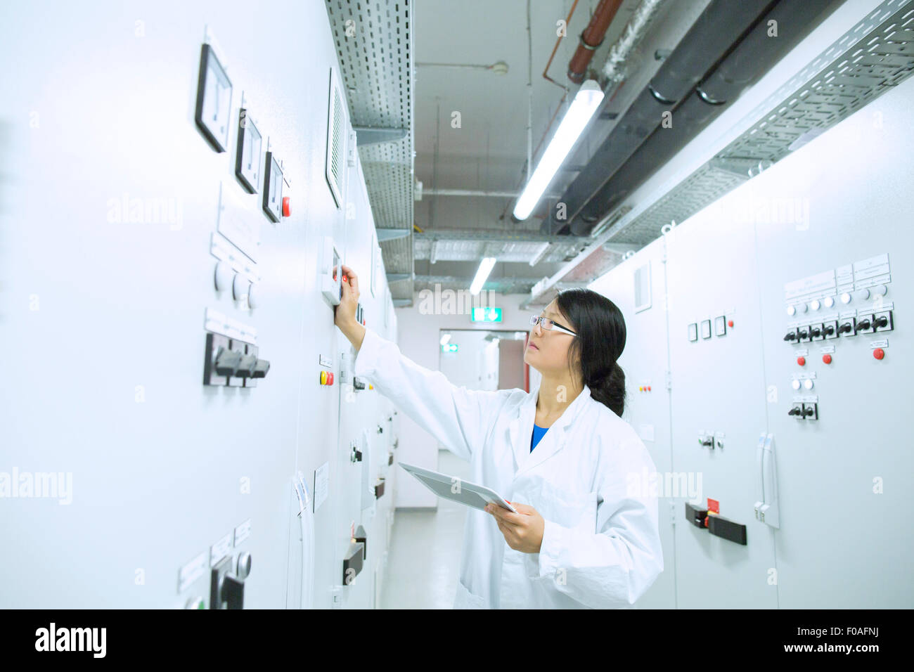 Scientist in control room Stock Photo - Alamy