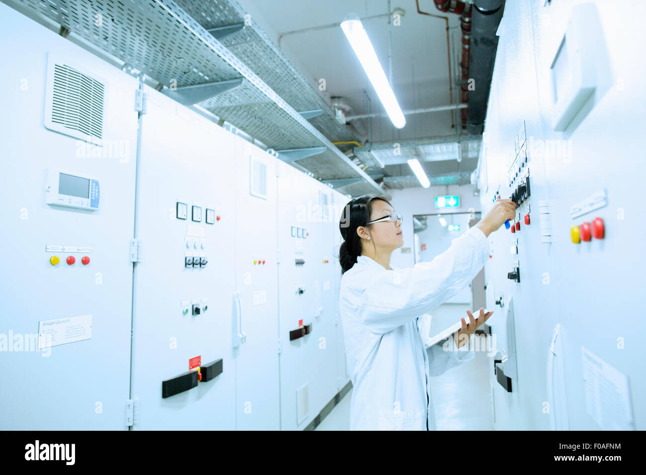 Scientist in control room Stock Photo - Alamy