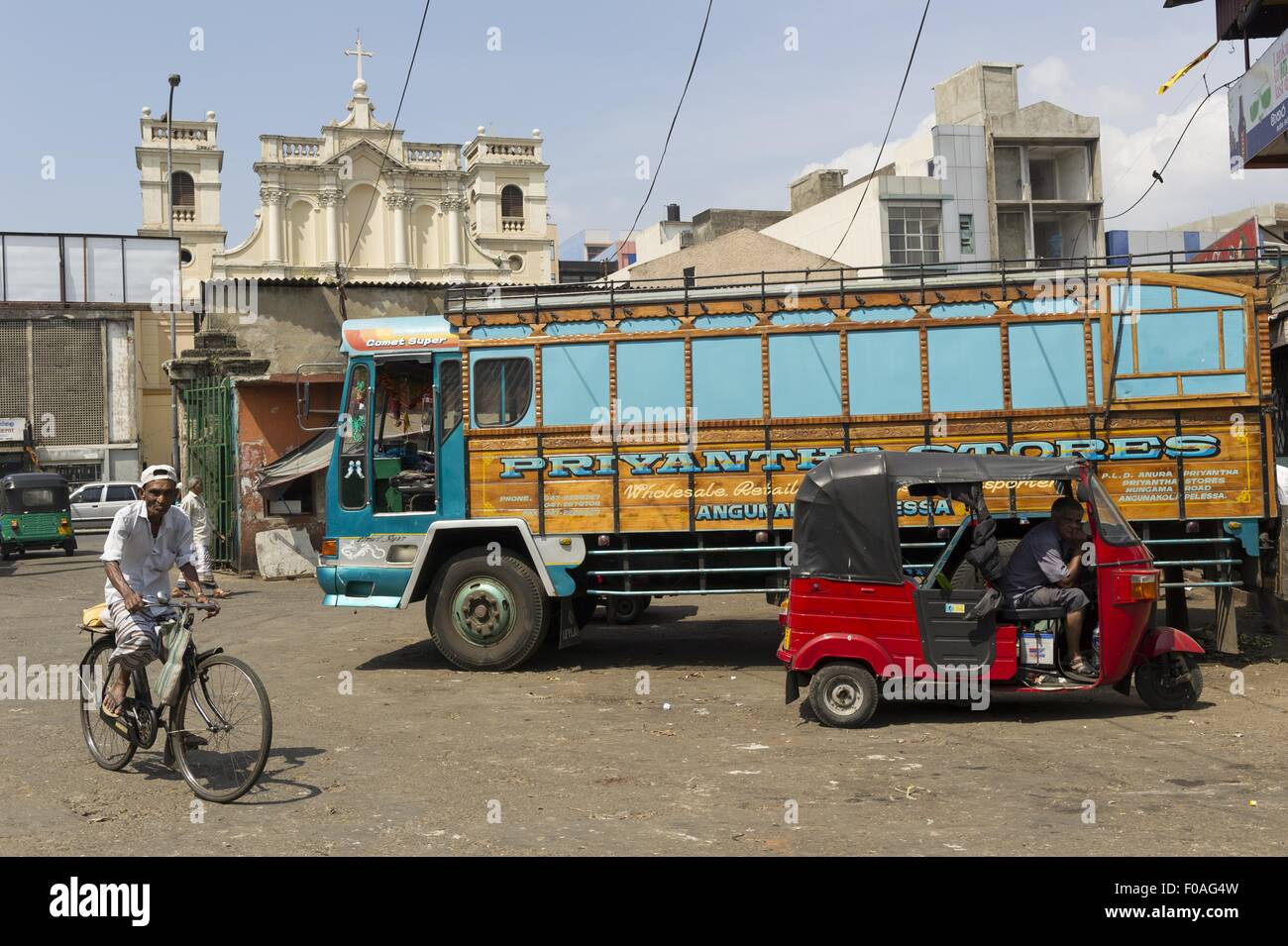 Truck and rickshaw in traffic on street at Colombo, Sri Lanka Stock ...