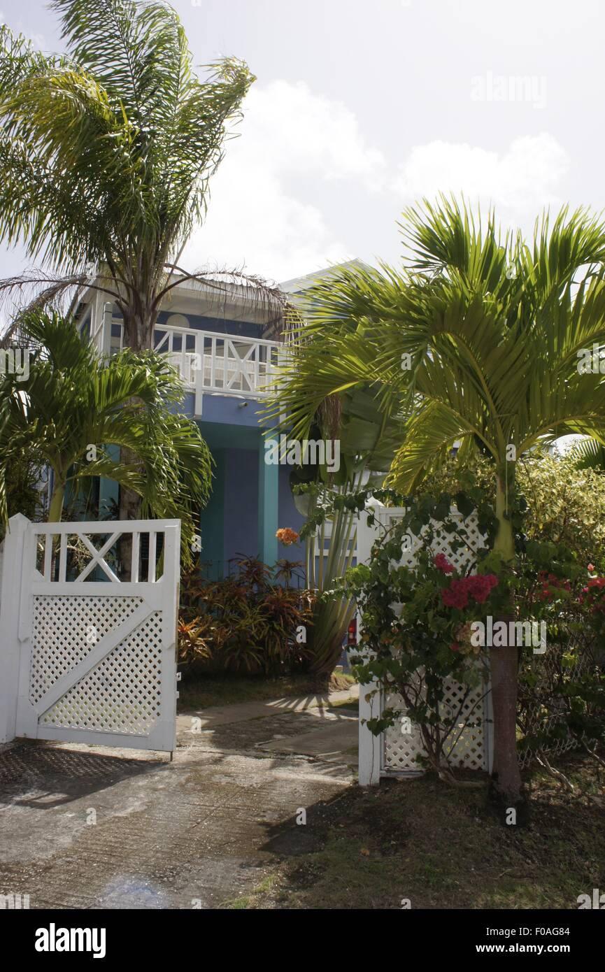 View of house with people at Lesser Antilles, Caribbean island ...