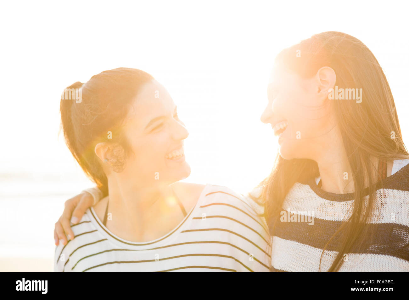 A portrait of best friends laughing Stock Photo - Alamy
