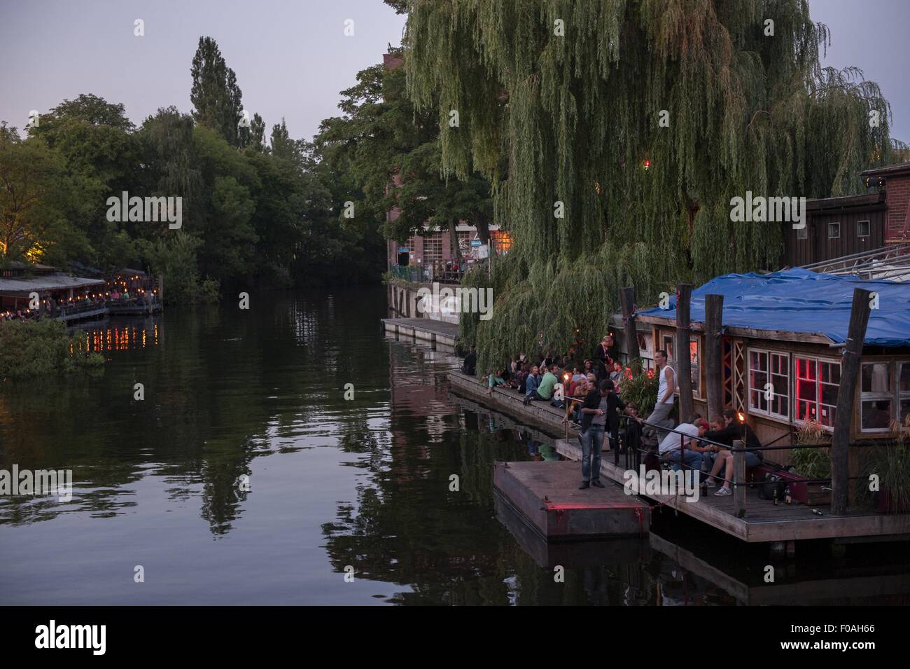 People relaxing at Club der Visionaere, Treptow, Berlin, Germany Stock ...
