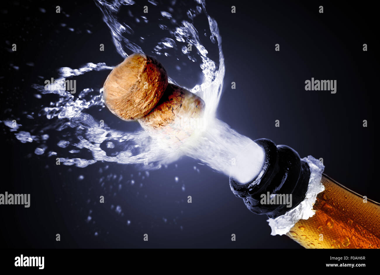 Close up of champagne cork popping Stock Photo - Alamy