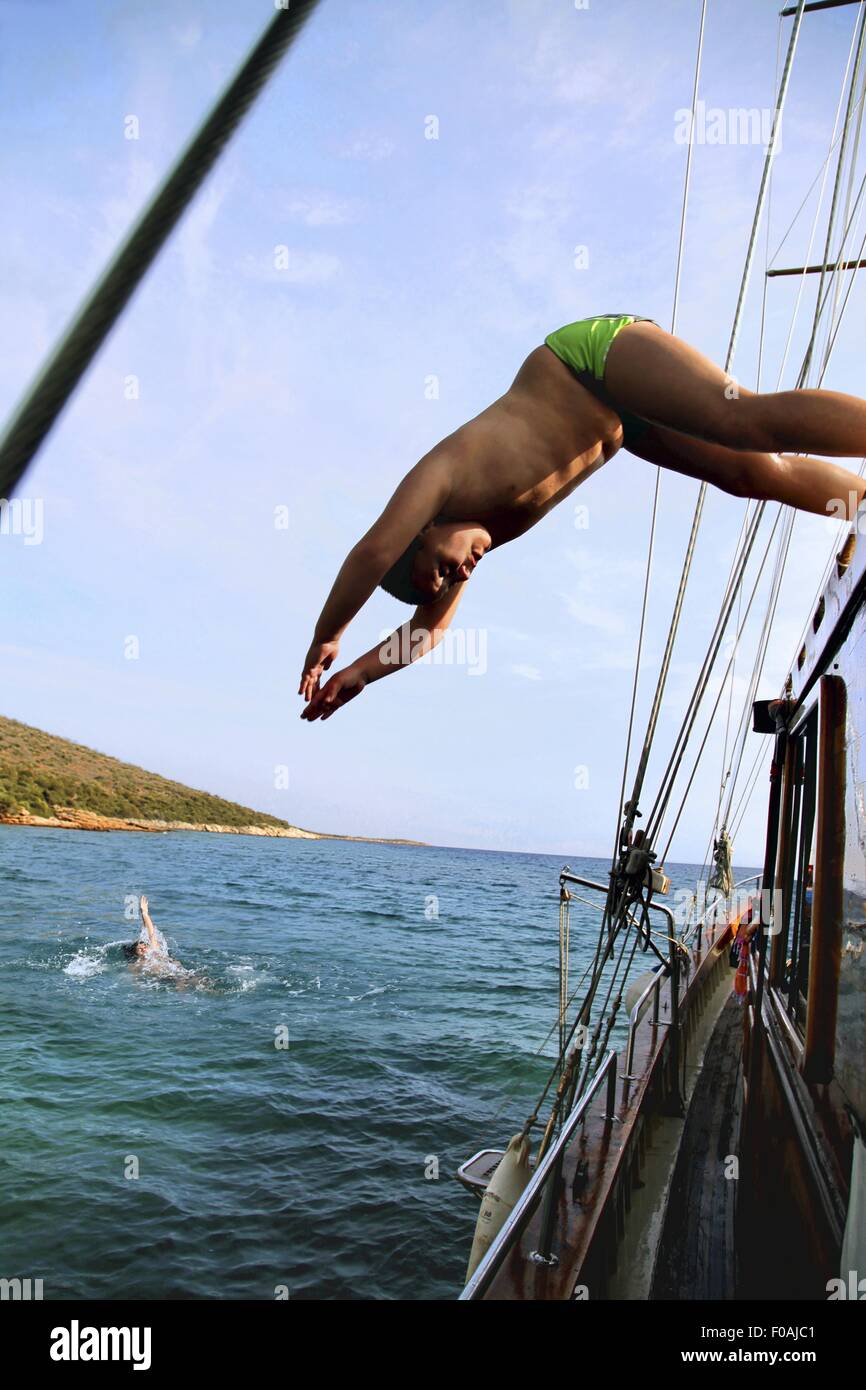 People swimming in Mediterranean peninsula, Aegean, Turkey Stock Photo ...