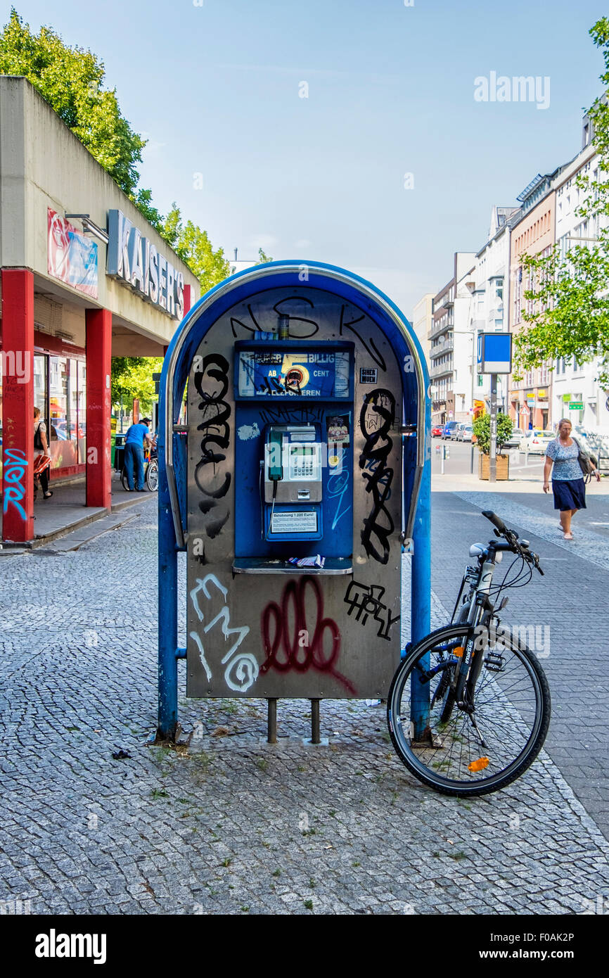 Berlin phone box graffiti hi-res stock photography and images - Alamy