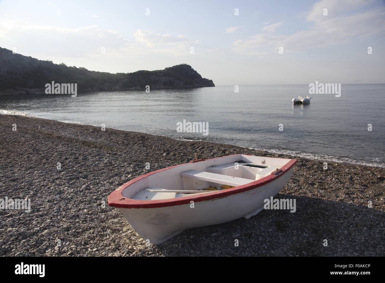Empty boat on Ovabuku beach, Mesudiye, Datca, Turkey Stock Photo - Alamy