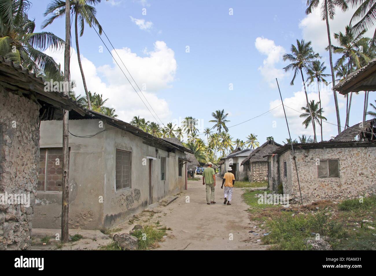Locals walking on street in Zanzibar Island, Tanzania, East Africa ...