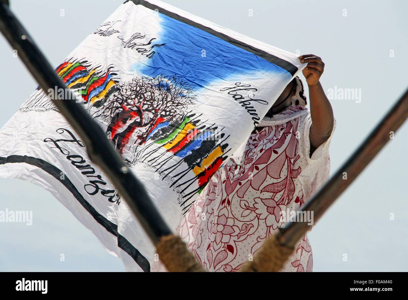 Local holding Zanzibar print cloth in Zanzibar Island, Tanzania, East ...