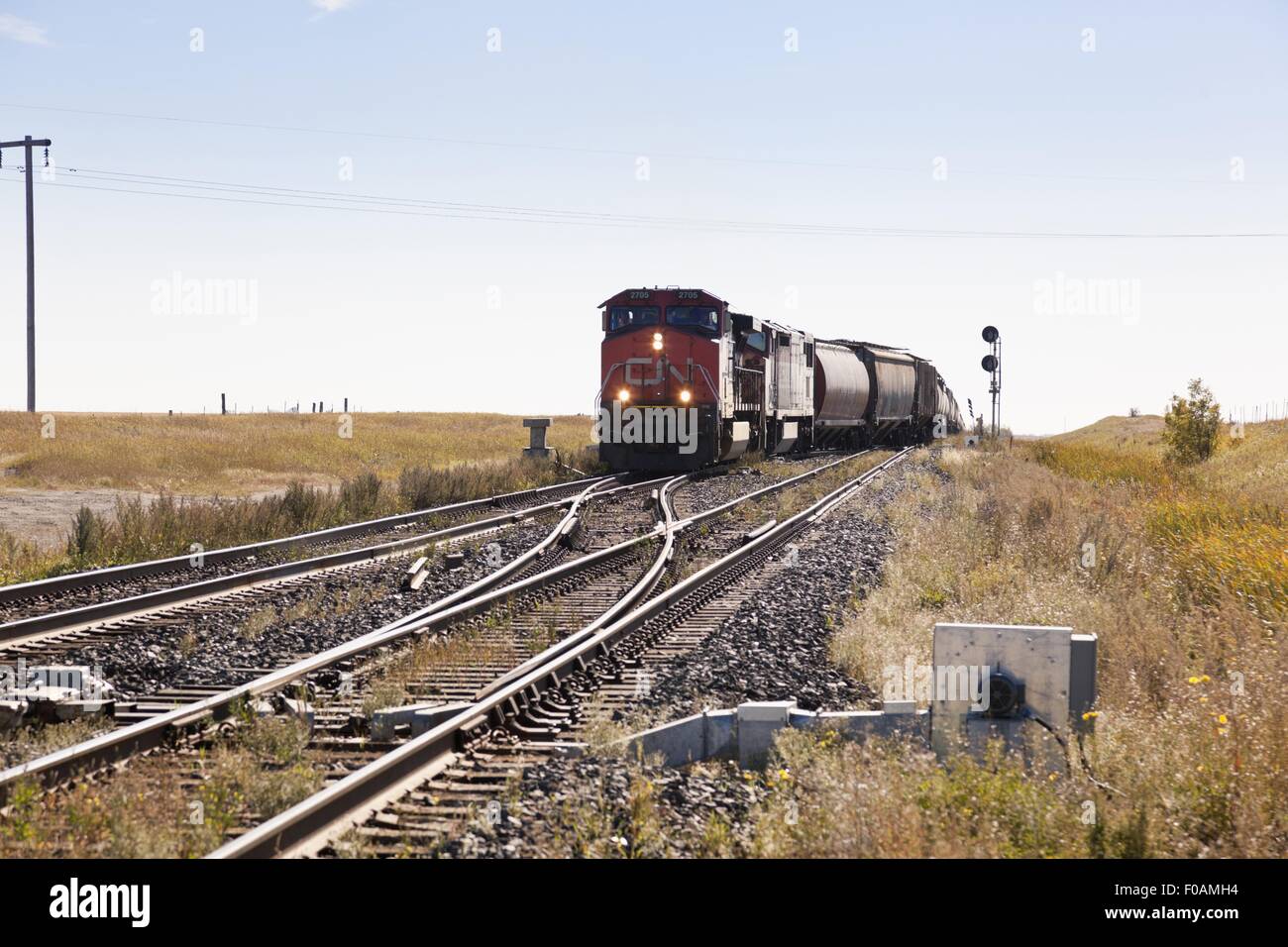 View of train and railway line in Watrous small town, Saskatchewan ...