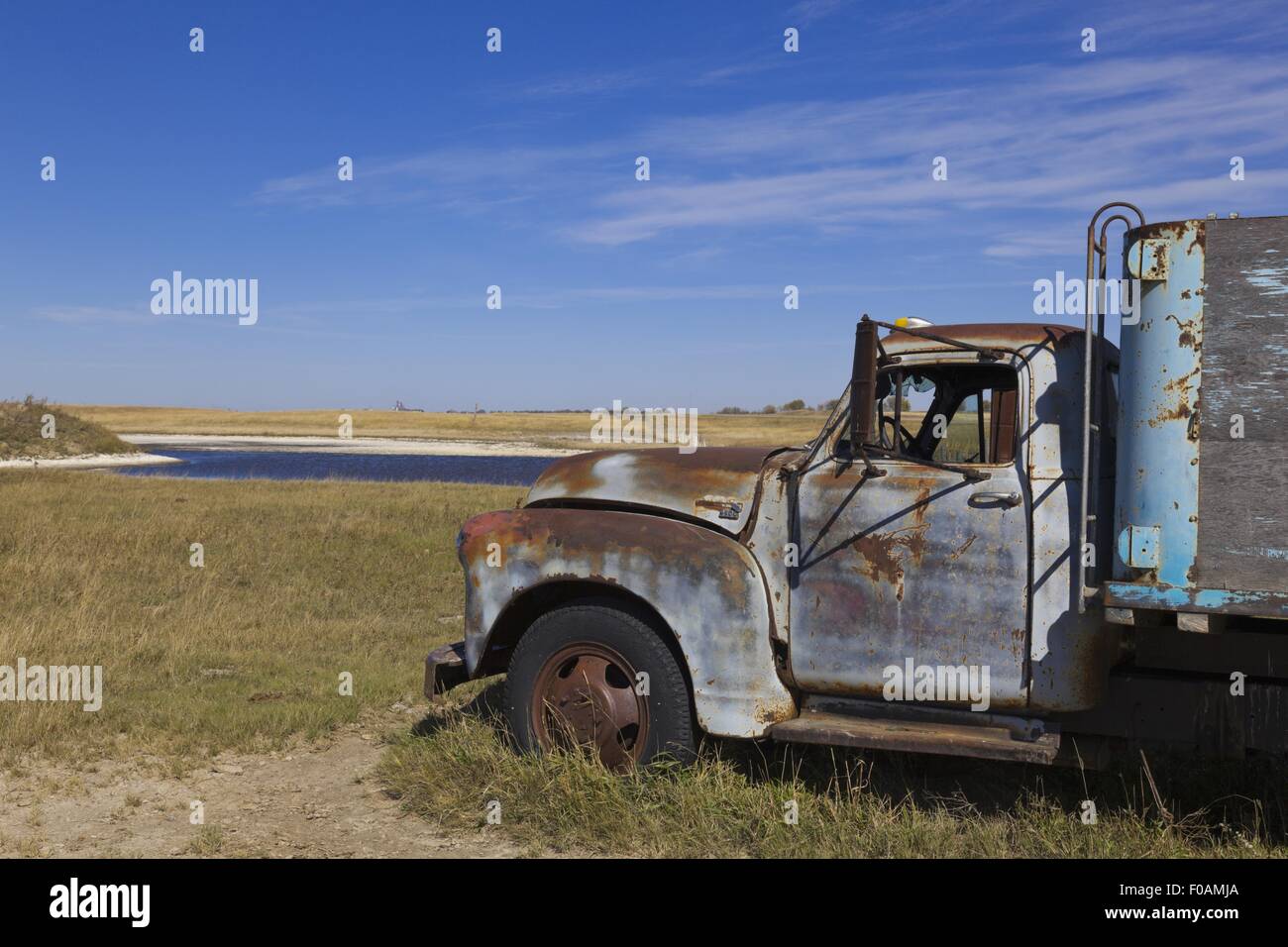 View of old truck on landscape at Highway 20, Saskatchewan, Canada ...