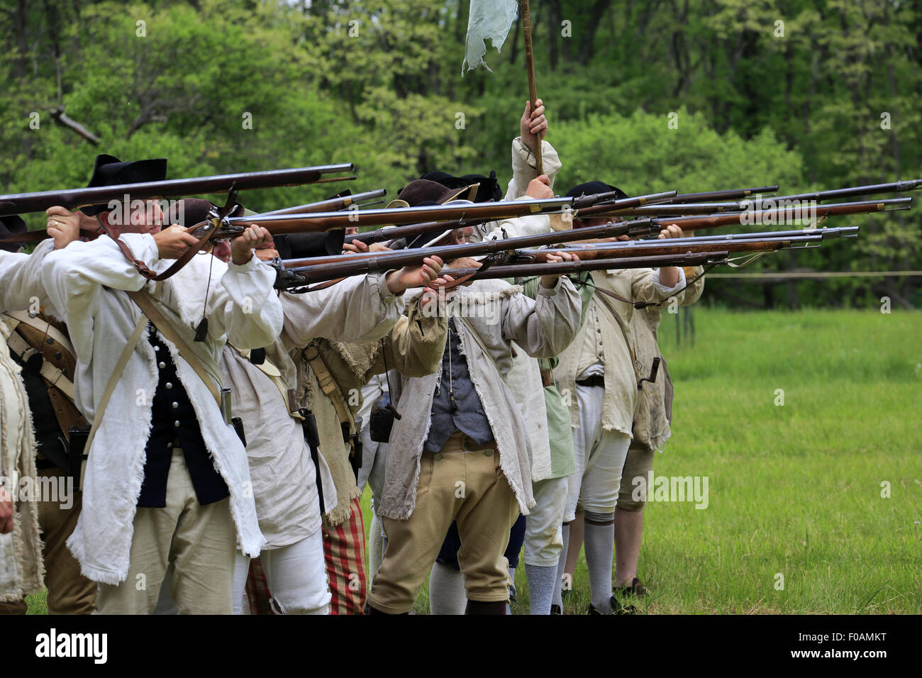 Musket firing during Revolutionary War reenactment at Jockey Hollow in ...