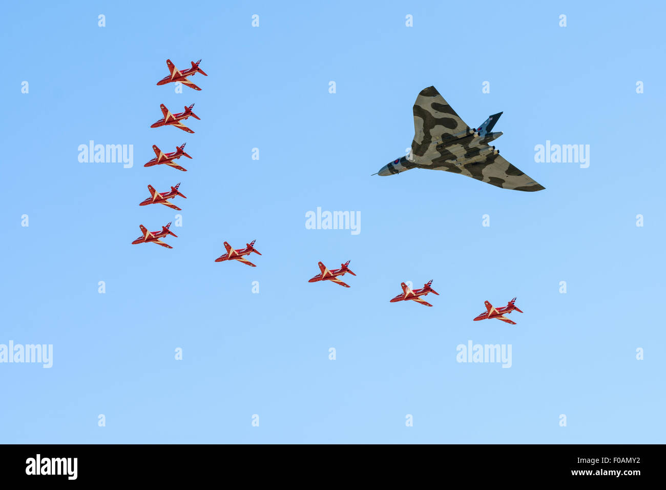 Avro Vulcan XH558 flying in formation with the RAF Red Arrows Stock ...