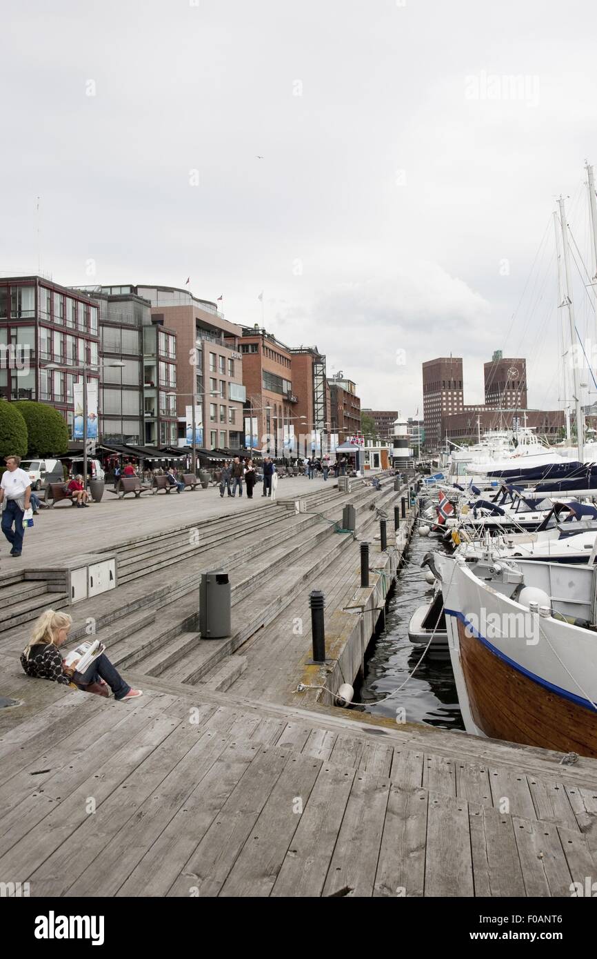 Boats moored at pier in Aker Brygge, Oslo, Norway Stock Photo - Alamy
