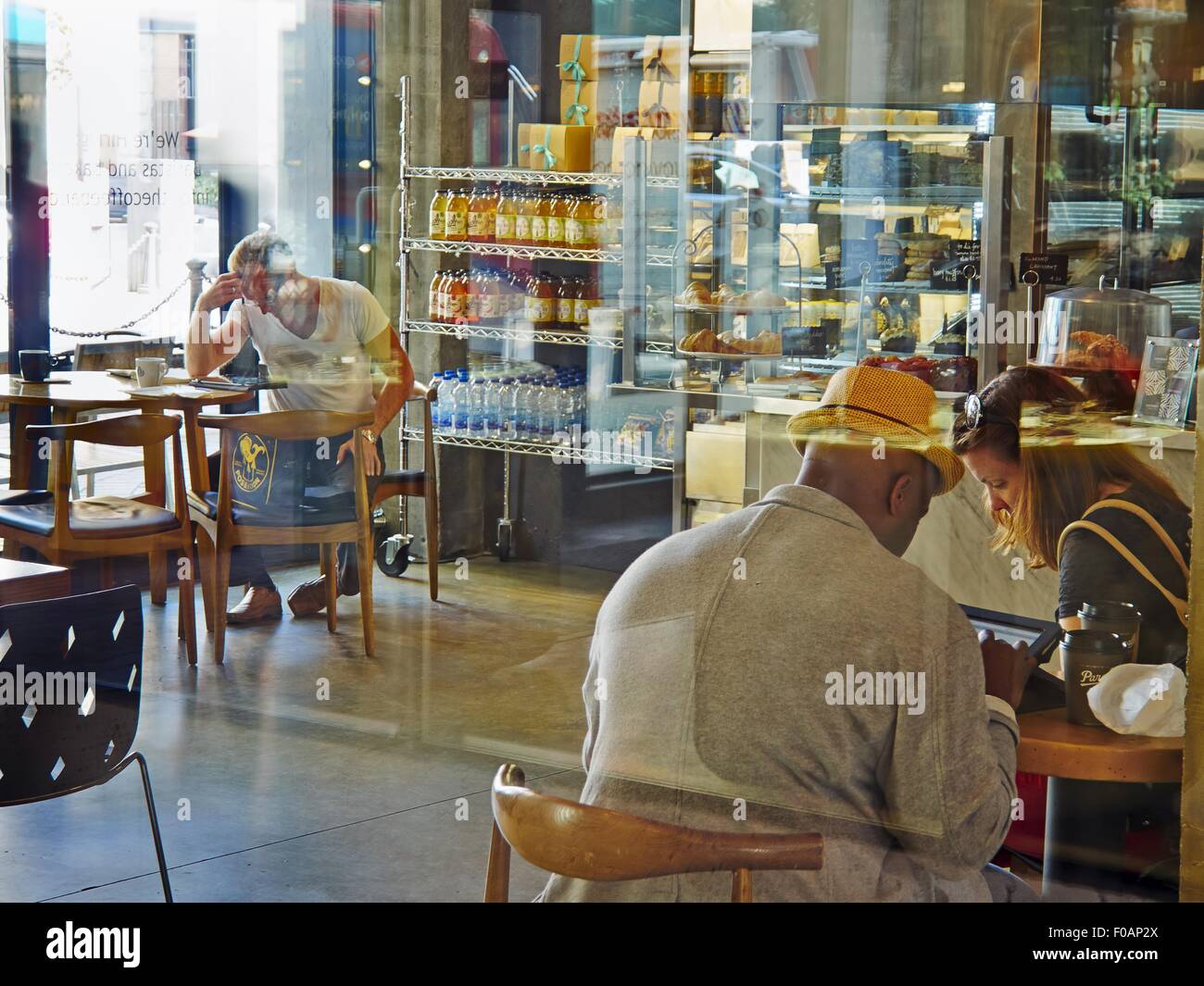 People sitting in cafe, Gastown, Vancouver, British Columbia, Canada ...