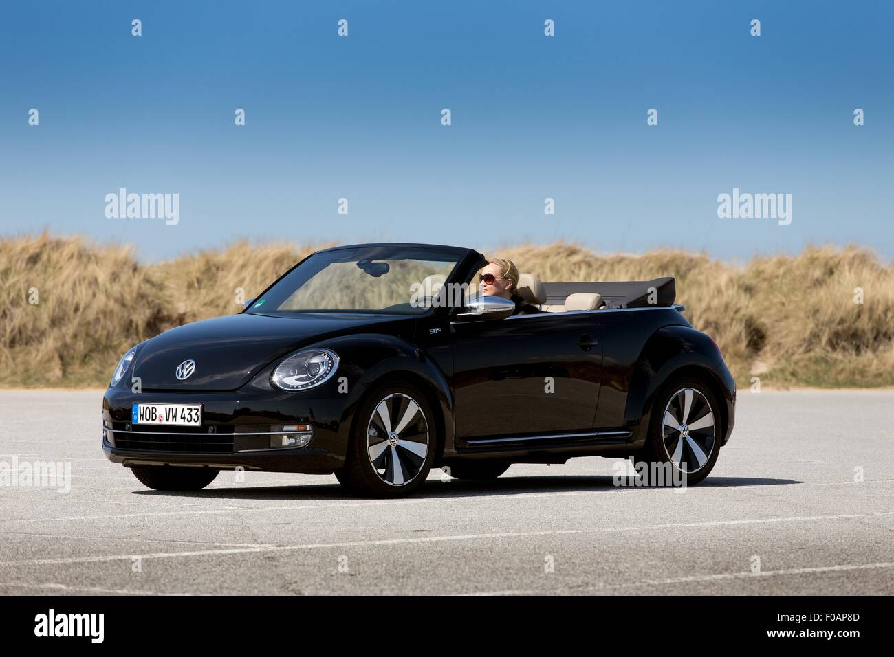 Person driving black convertible car, Schleswig-Holstein, Germany Stock ...