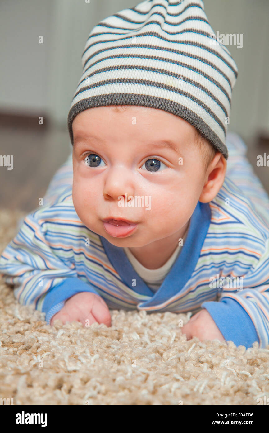 Portrait of a 2 months old baby boy at his home Stock Photo - Alamy