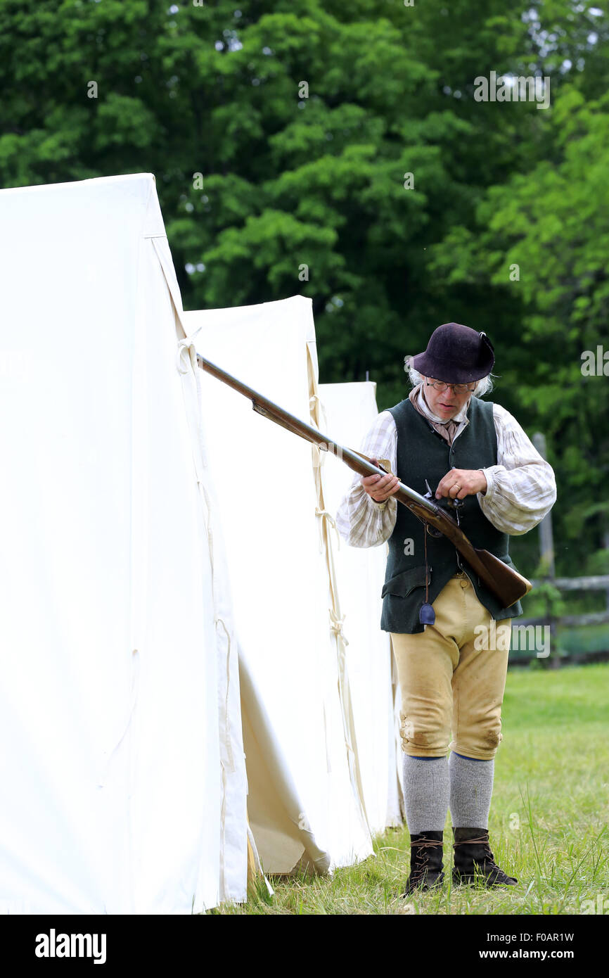 An reenactor Continental Army soldier with a musket in George ...