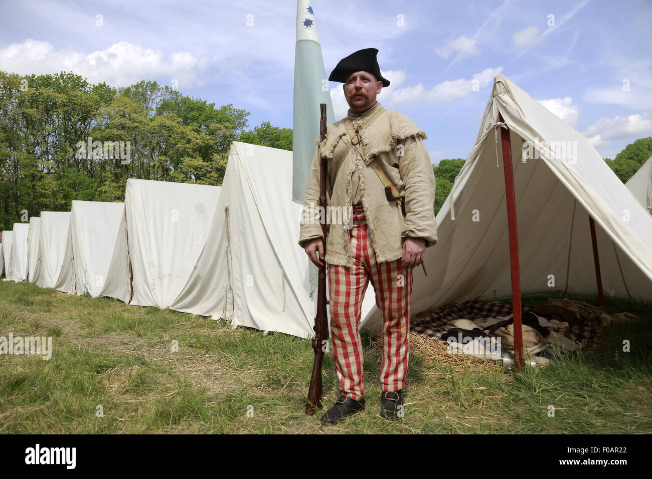 An reenactor Continental Army soldier with a musket in George ...
