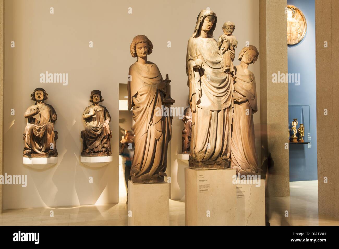 Children looking at sculptures of prophets in Munster at sculpture hall ...
