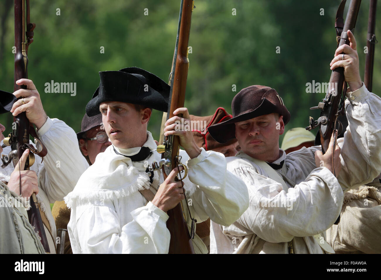 Continental Army soldiers with muskets in Revolutionary War reenactment ...