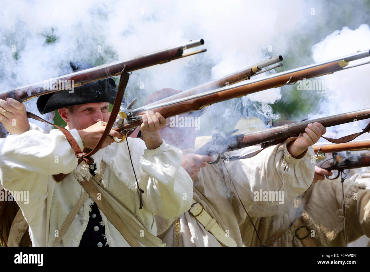 Continental Army soldiers firing muskets during Revolutionary War ...